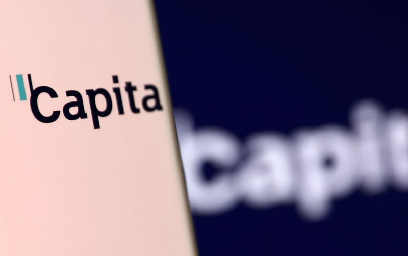Illustration shows smartphone with Capita’s logo – One America News Network