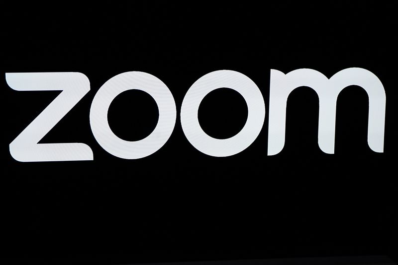 The Zoom Video Communications logo is pictured at the NASDAQ – One ...