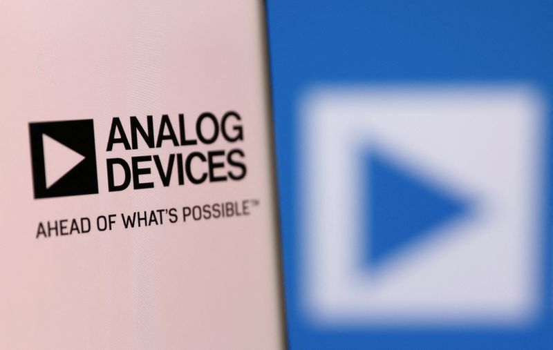 FILE PHOTO: Illustration shows smartphone with Analog Devices’ logo ...